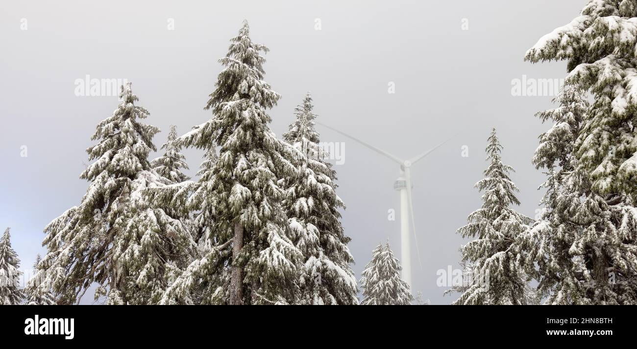 Wind Turbine on top of Grouse Mountain during cloudy winter season ...
