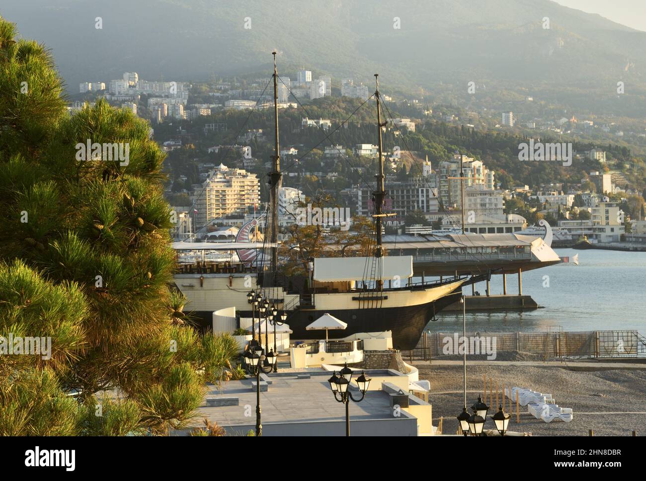 Yalta, Crimea, Russia - 05.09.2019: Stylized vintage ships for fun on the Yalta waterfront early ...