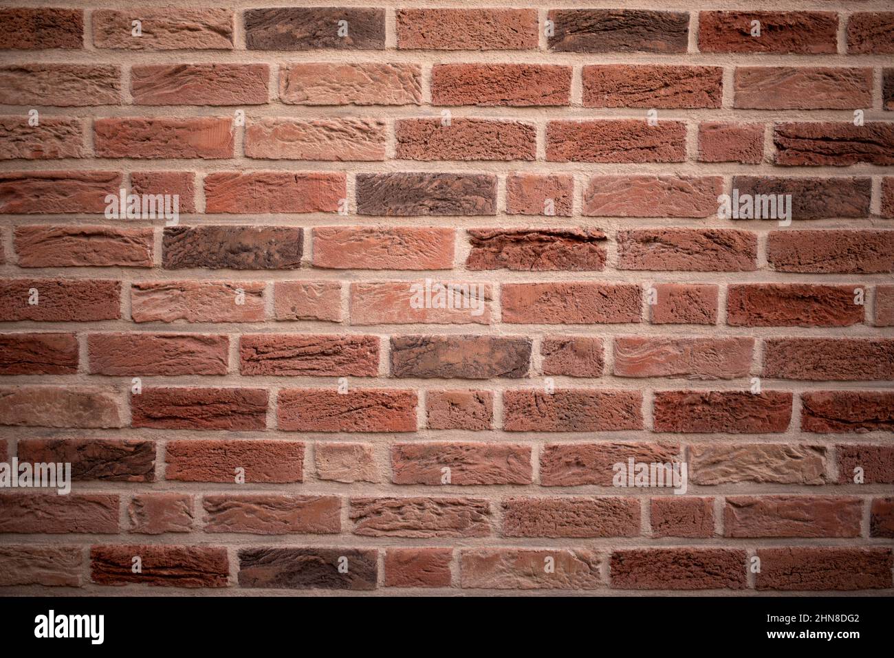 multi colored brick wall, texture abstract background Stock Photo - Alamy