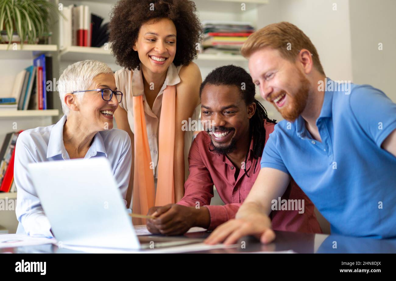 Group of happy friendly multiethnic business people having fun, working ...