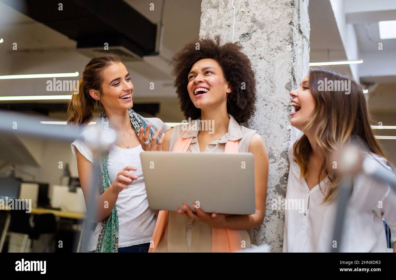 Group of happy friendly multiethnic business people having fun, working ...