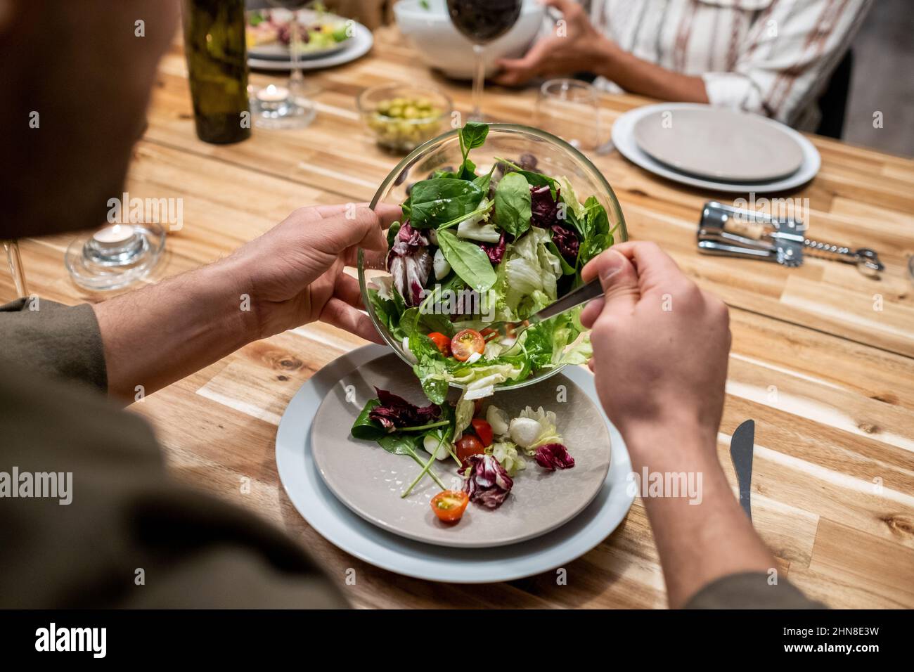 Woman eating healthy meal sitting table hi-res stock photography and ...