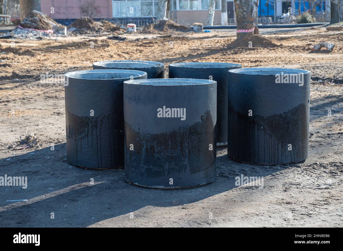 New iron-concrete rings at the construction site Stock Photo - Alamy