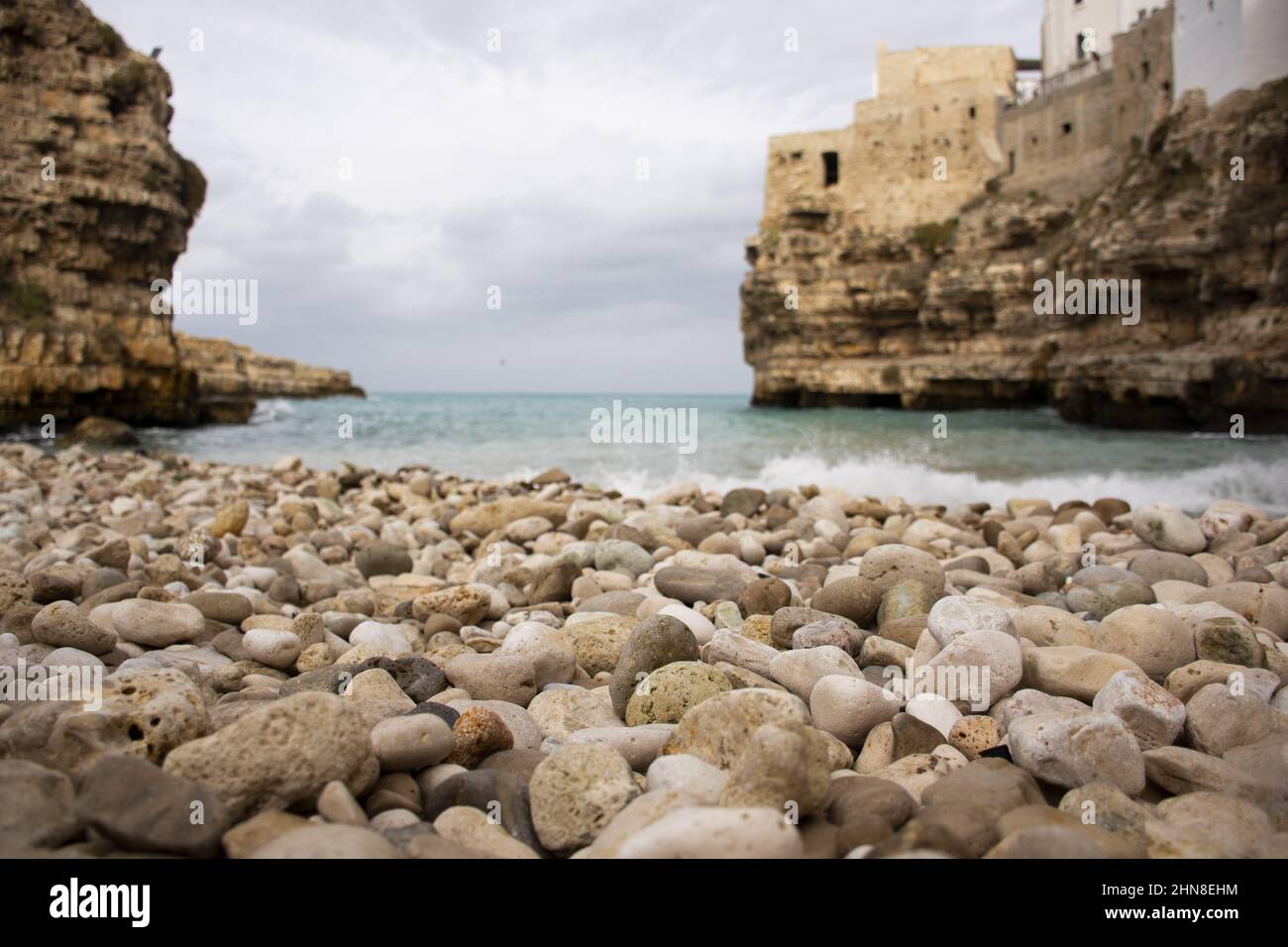 Old buildings on the shore. Lama Monachile, Polignano a Mare, Italy ...