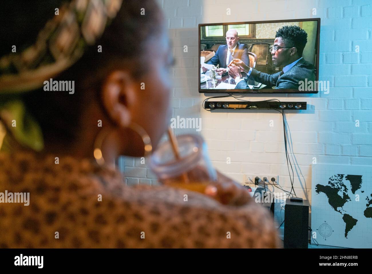 Adult watching film tv screen hi-res stock photography and images - Alamy