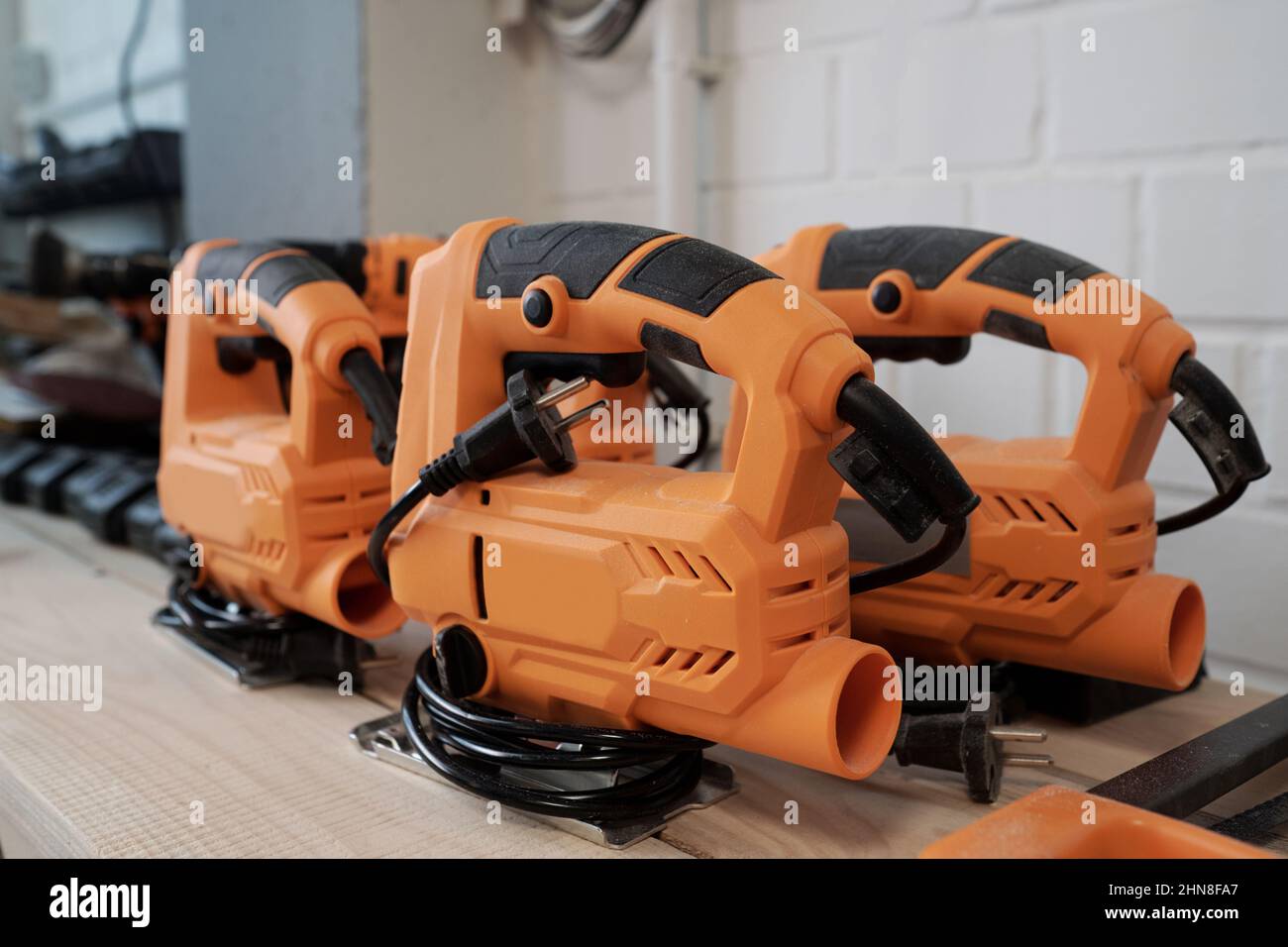 Background image of electric power tools in woodworking workshop, copy ...