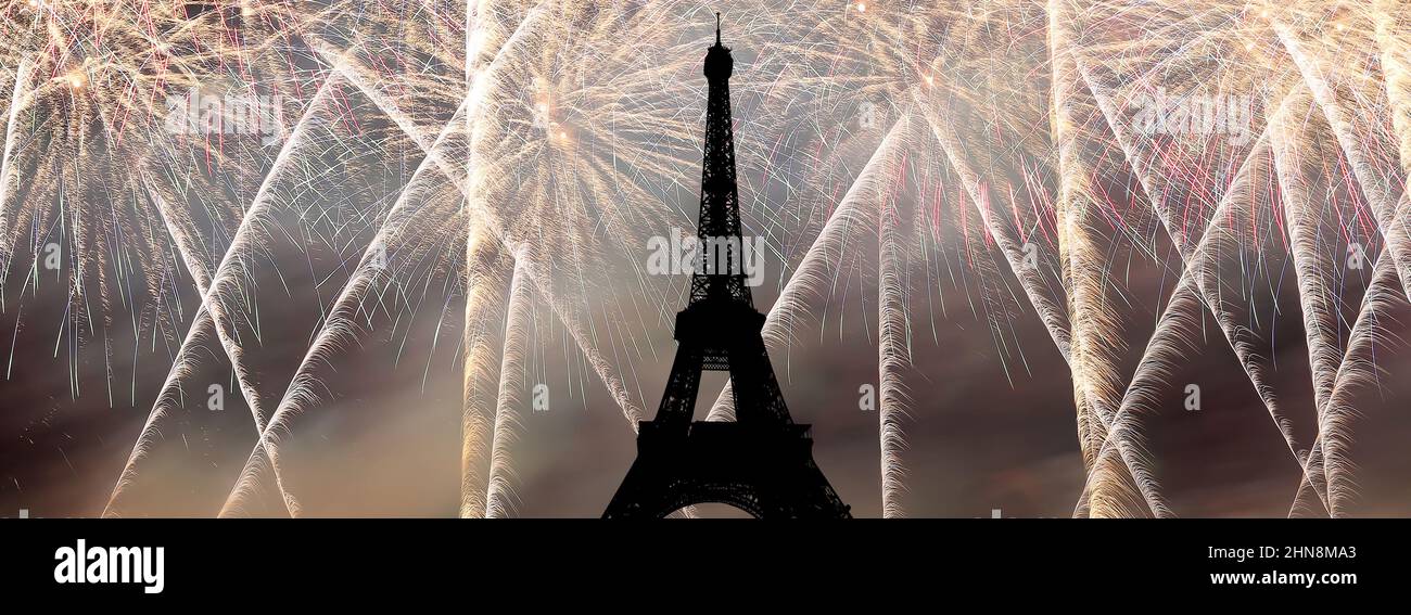 Celebratory colorful fireworks over the Eiffel Tower in Paris, France ...