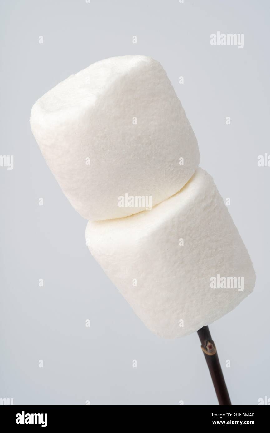 White marshmallows isolated on white background Stock Photo - Alamy