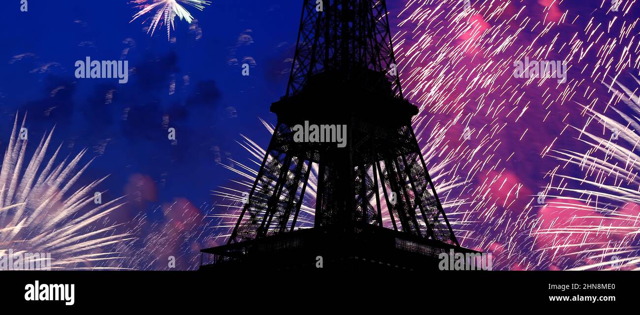 Celebratory colorful fireworks over the Eiffel Tower in Paris, France ...