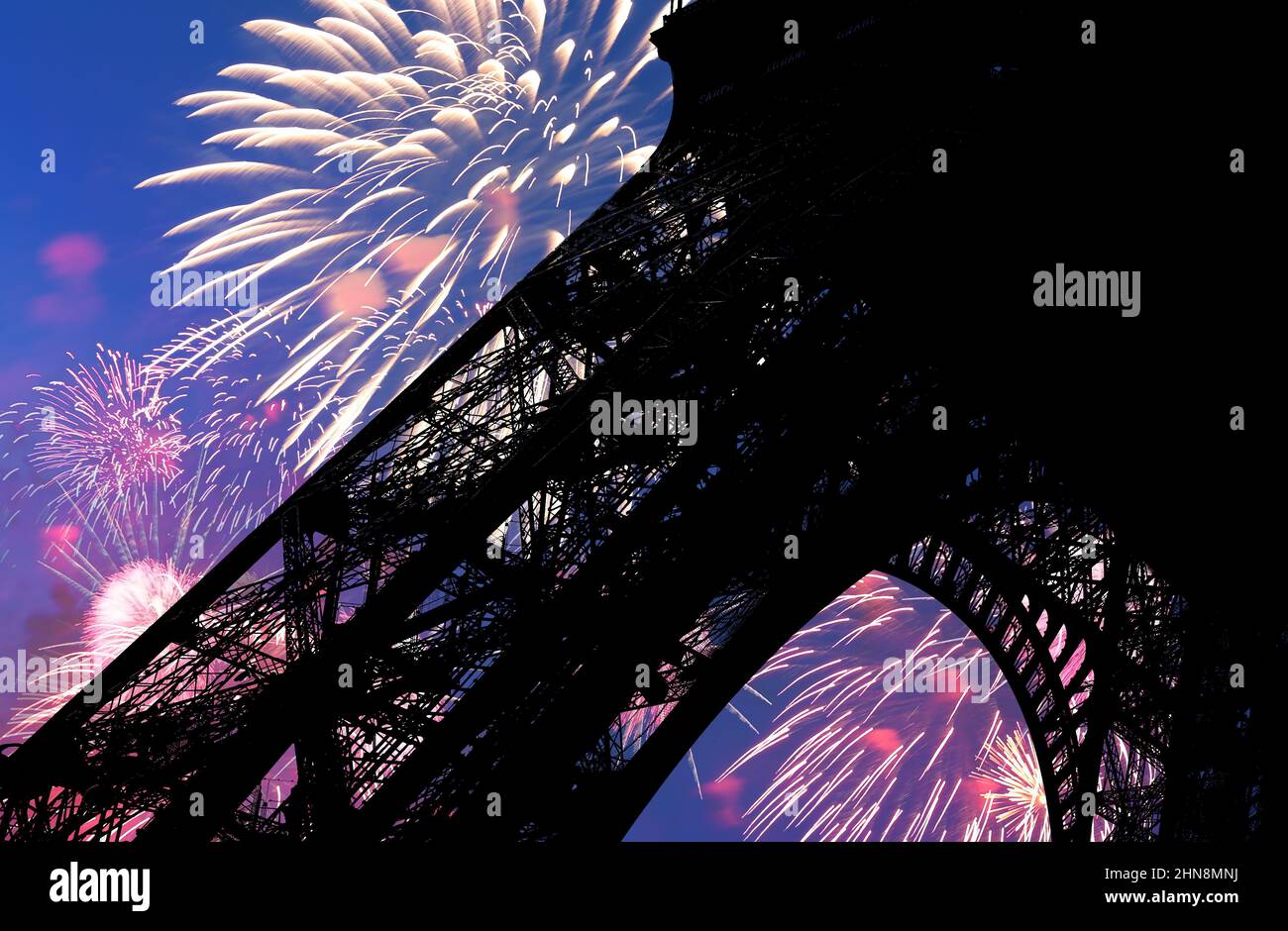 Celebratory colorful fireworks over the Eiffel Tower in Paris, France ...