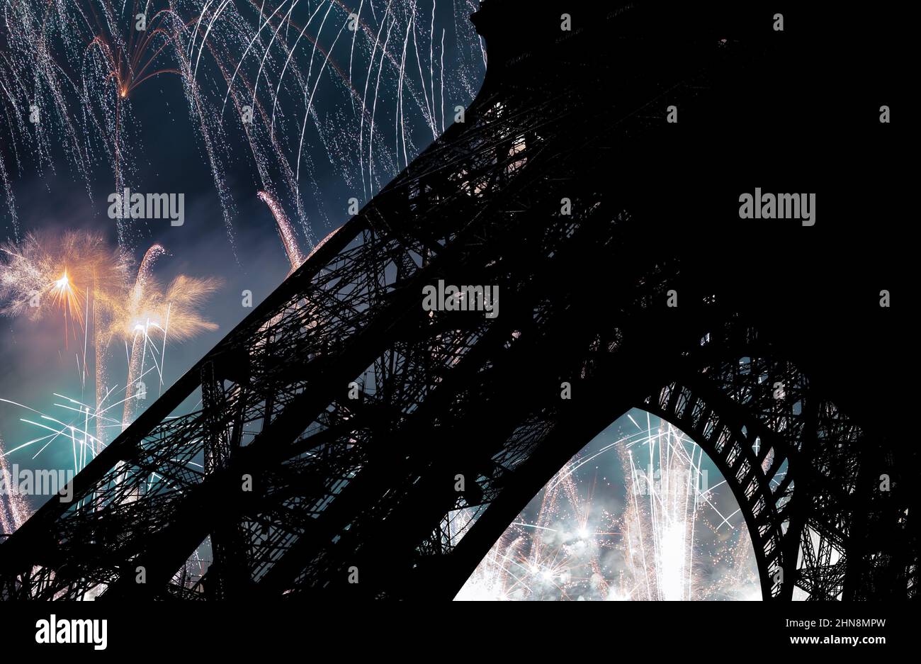 Celebratory colorful fireworks over the Eiffel Tower in Paris, France ...