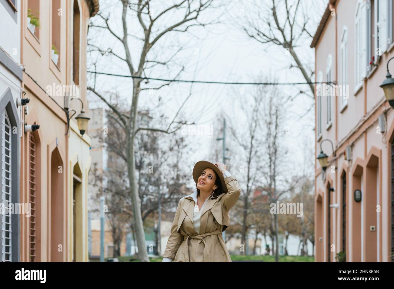 Woman traveler in hat walks hi-res stock photography and images - Alamy