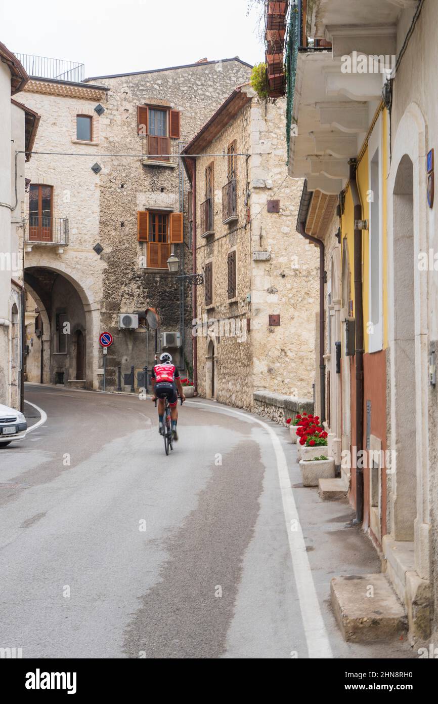 Via Roma street, Medieval village, Cyclist, Pacentro, Abruzzo, Italy ...