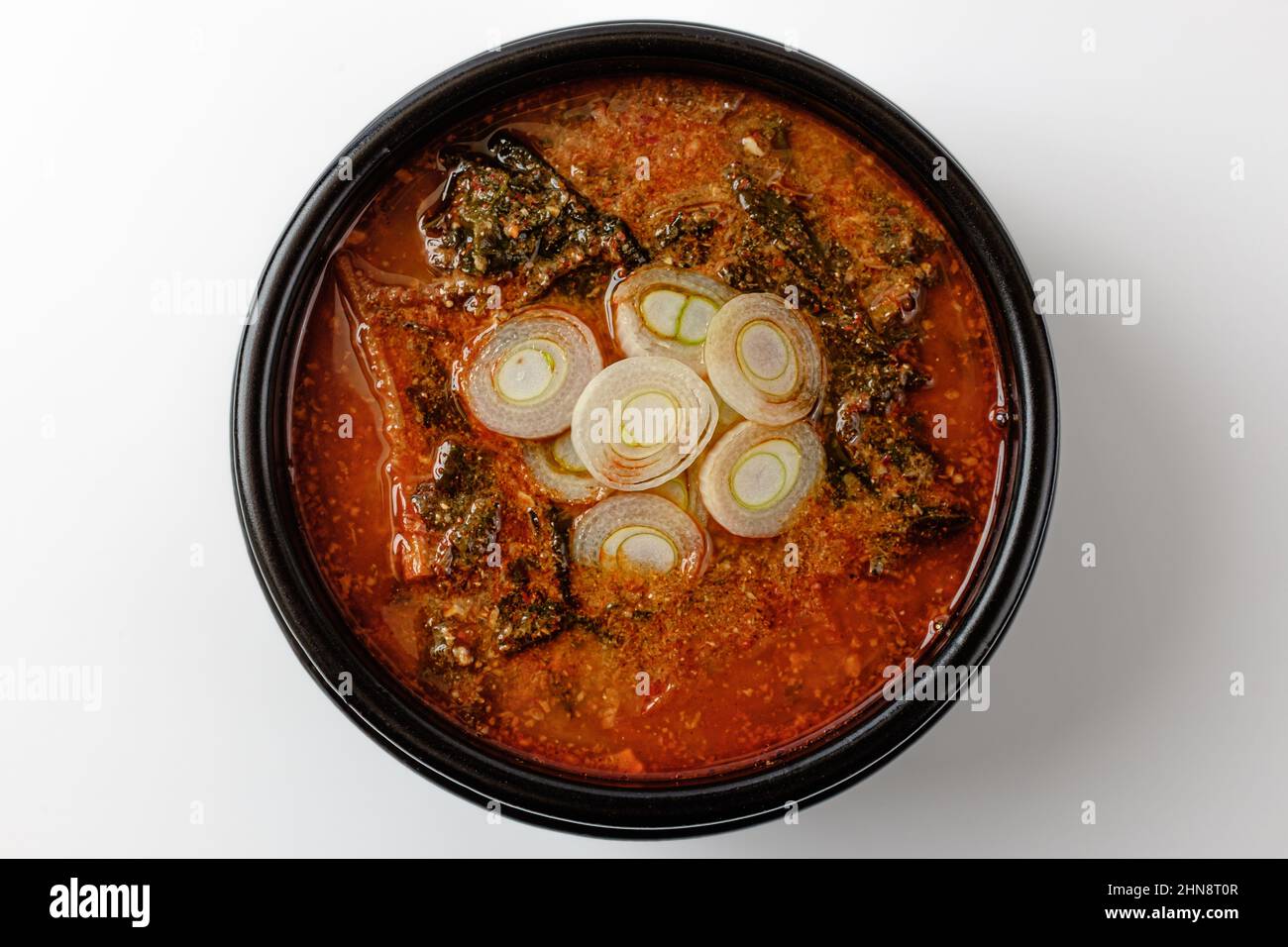 Eel soup on white background Stock Photo - Alamy