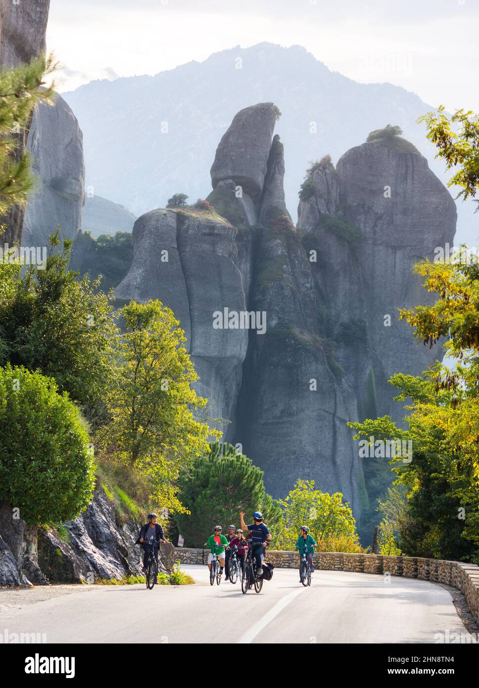 23 October 2021, Meteora, Greece: The bicycle group tour goes up the ...
