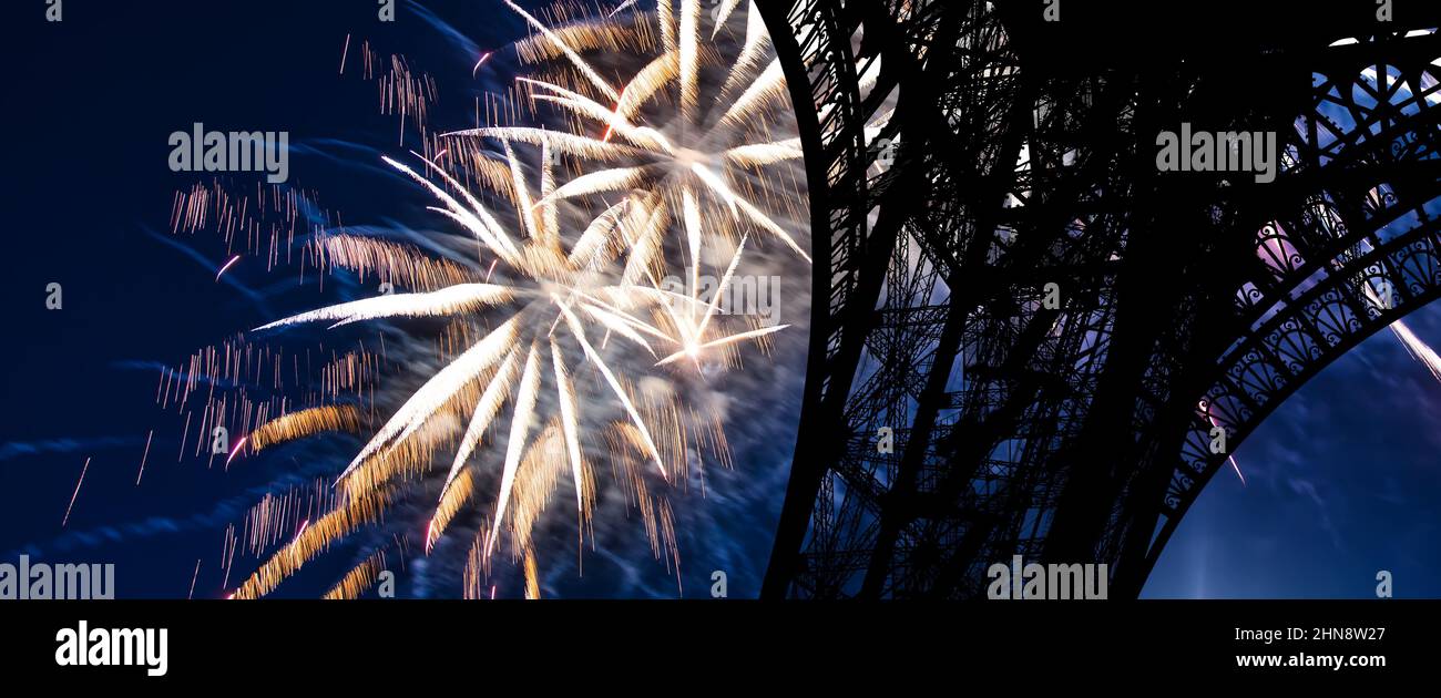 Celebratory colorful fireworks over the Eiffel Tower in Paris, France ...