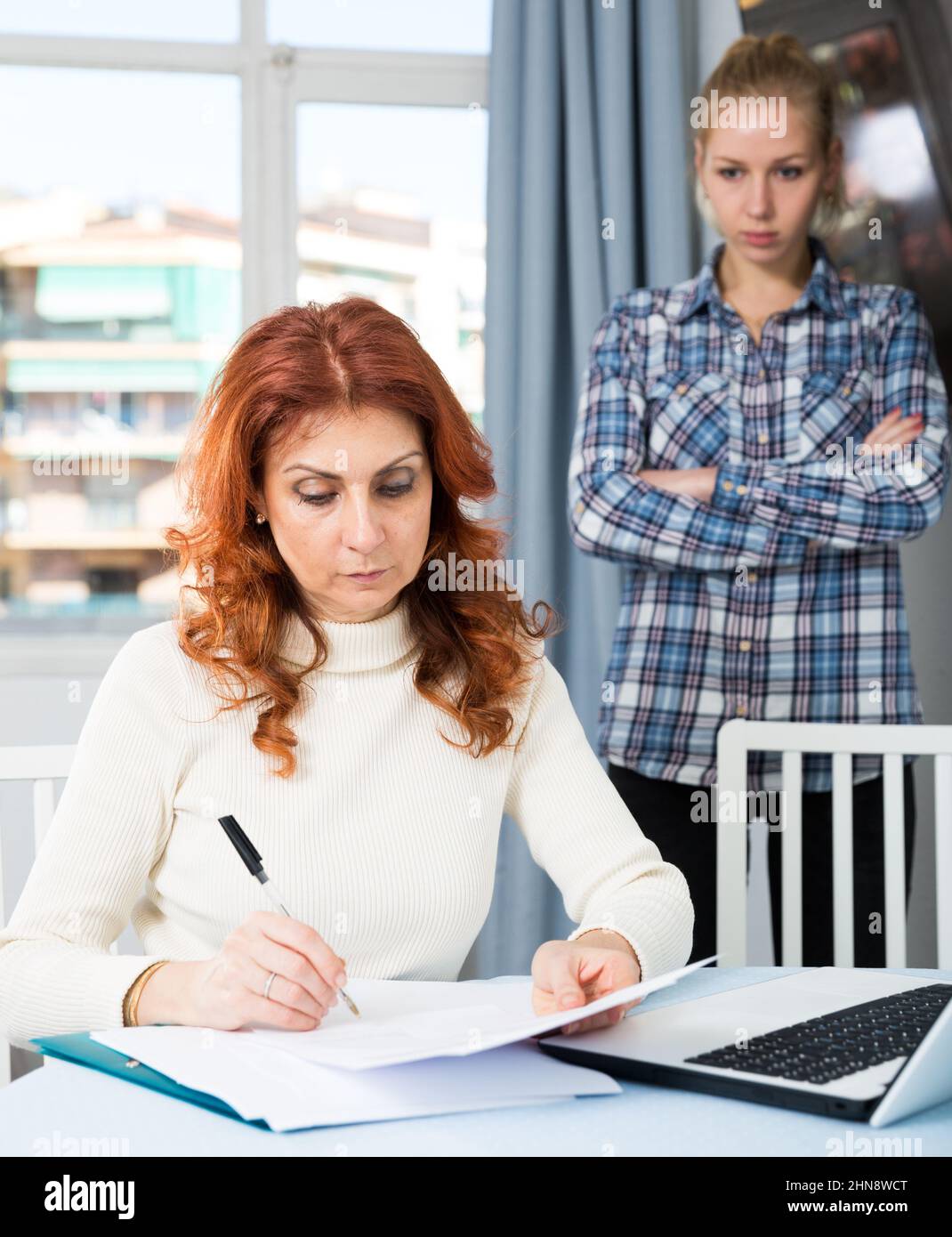 Woman emotionally complaining about poor academic performance of her ...