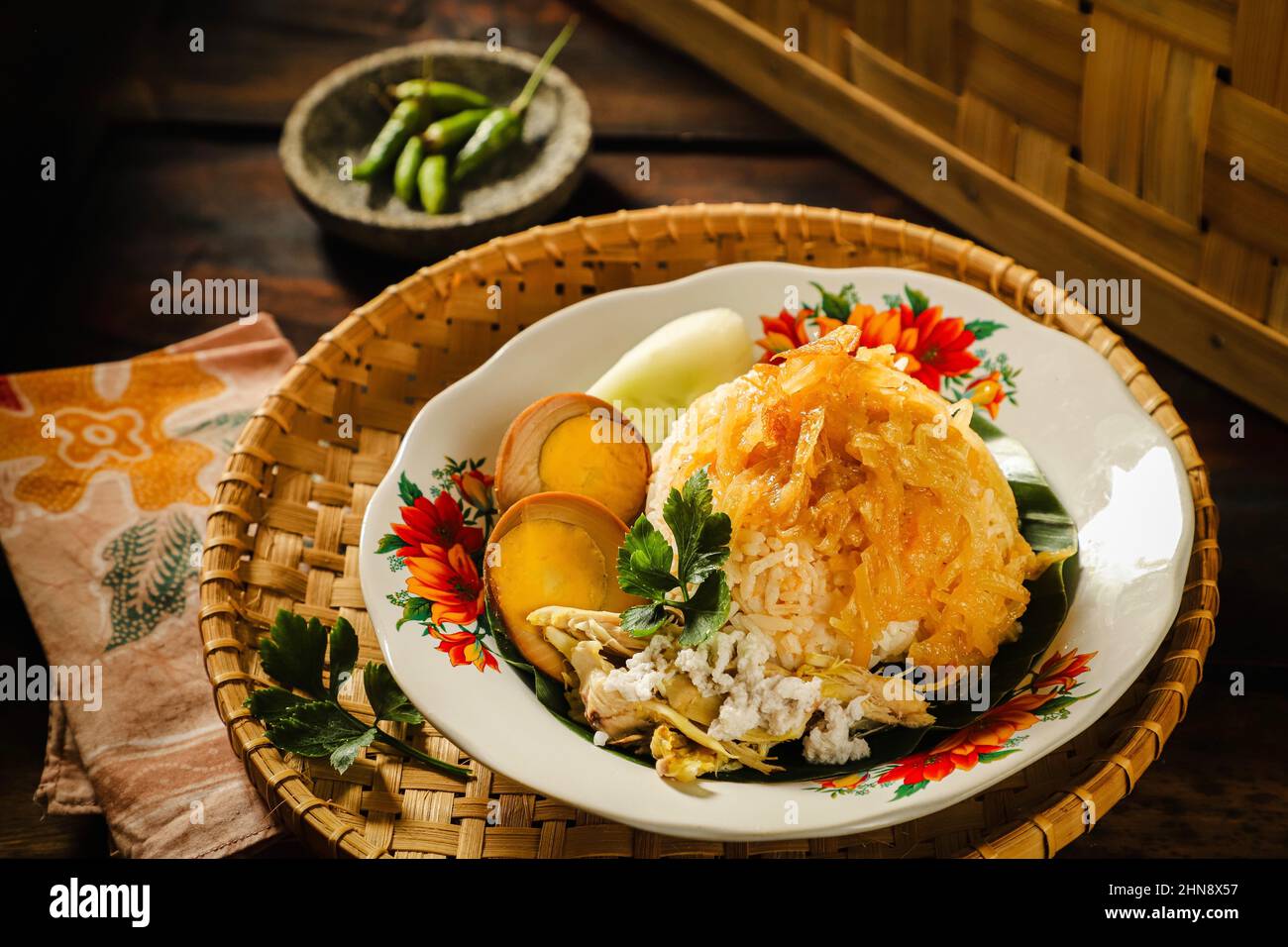 Nasi Liwet Solo. Javanese meal of savoury rice with chicken, egg, and ...