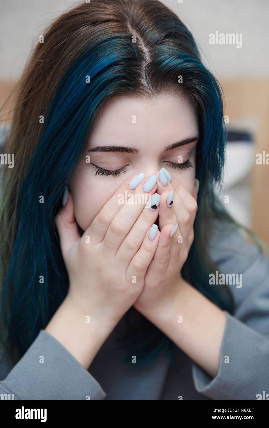 Dark hair teenager female sad hi-res stock photography and images - Alamy