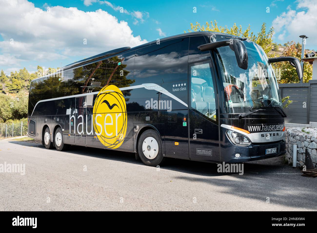 25 October 2021, Nikiti, Greece: Tourist coach with Hauser Tour ...