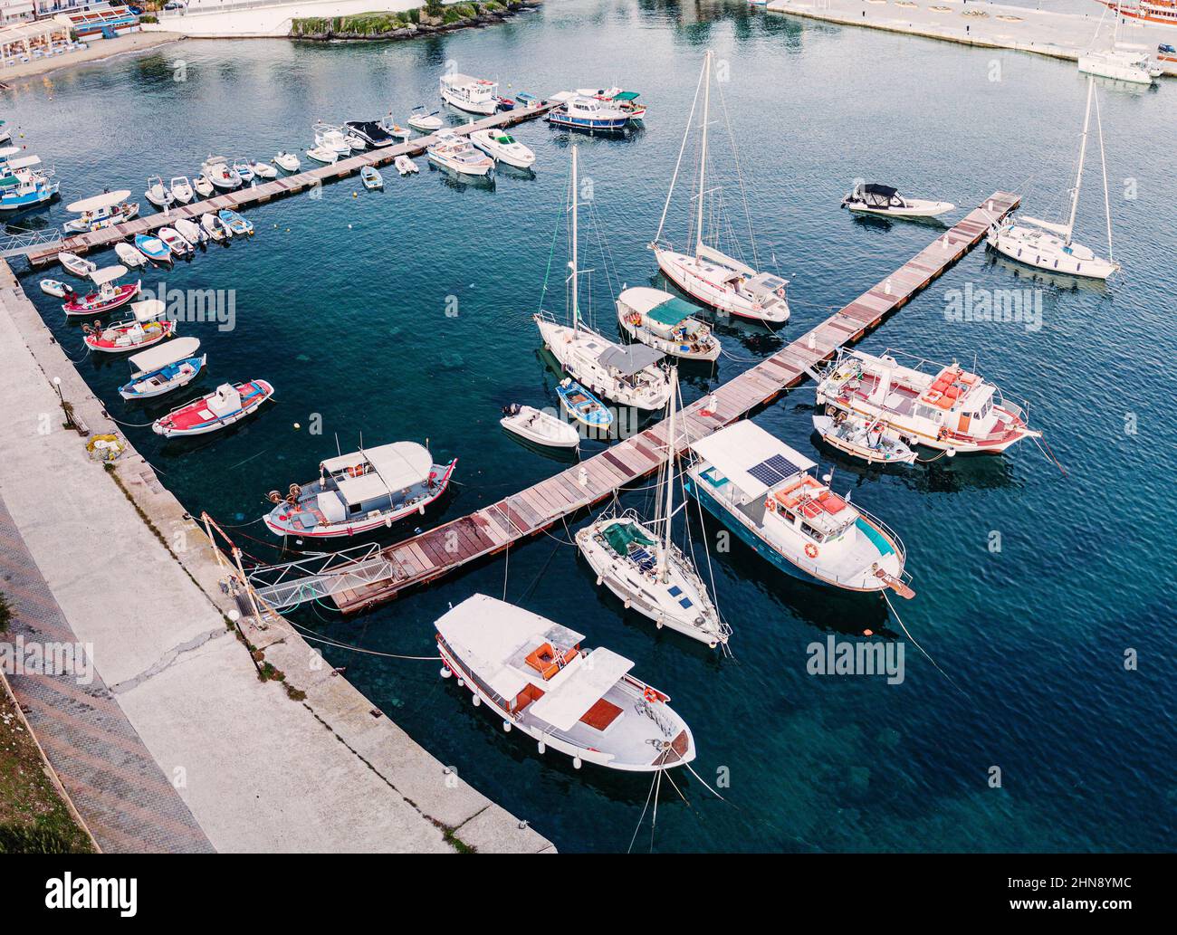 Aerial view of the marina port with parked yachts and cruise and ...