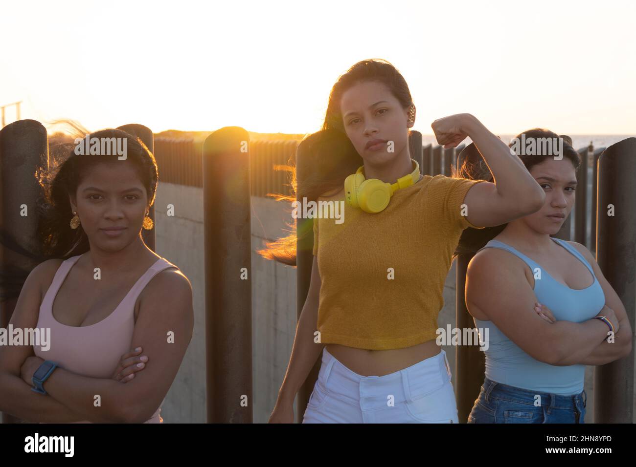Hispanic Women Friends Hanging Out In The City. Femininity Concept ...