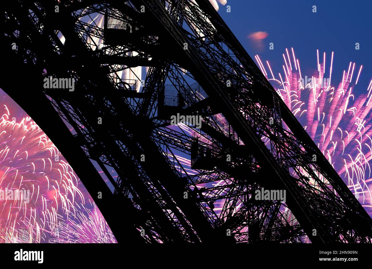 Celebratory colorful fireworks over the Eiffel Tower in Paris, France ...