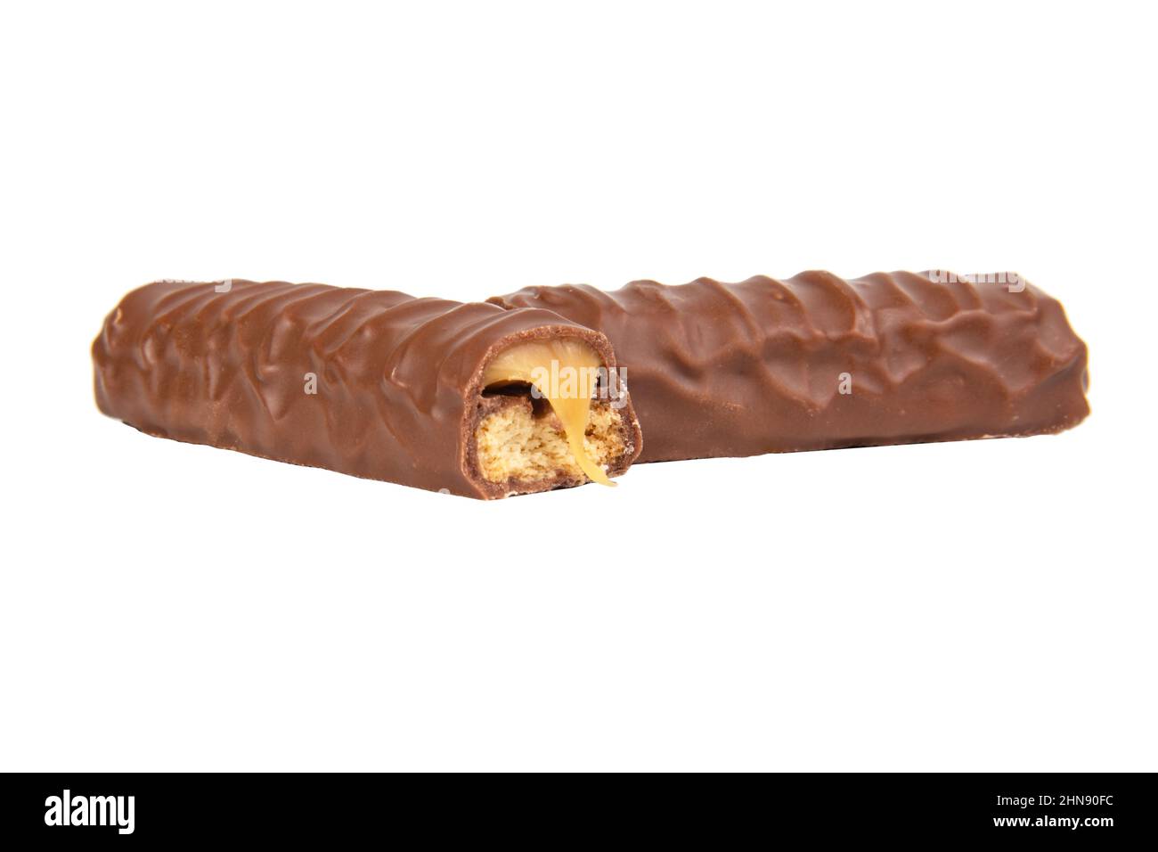Tasty chocolate bar stick caramel isolated on the white background ...