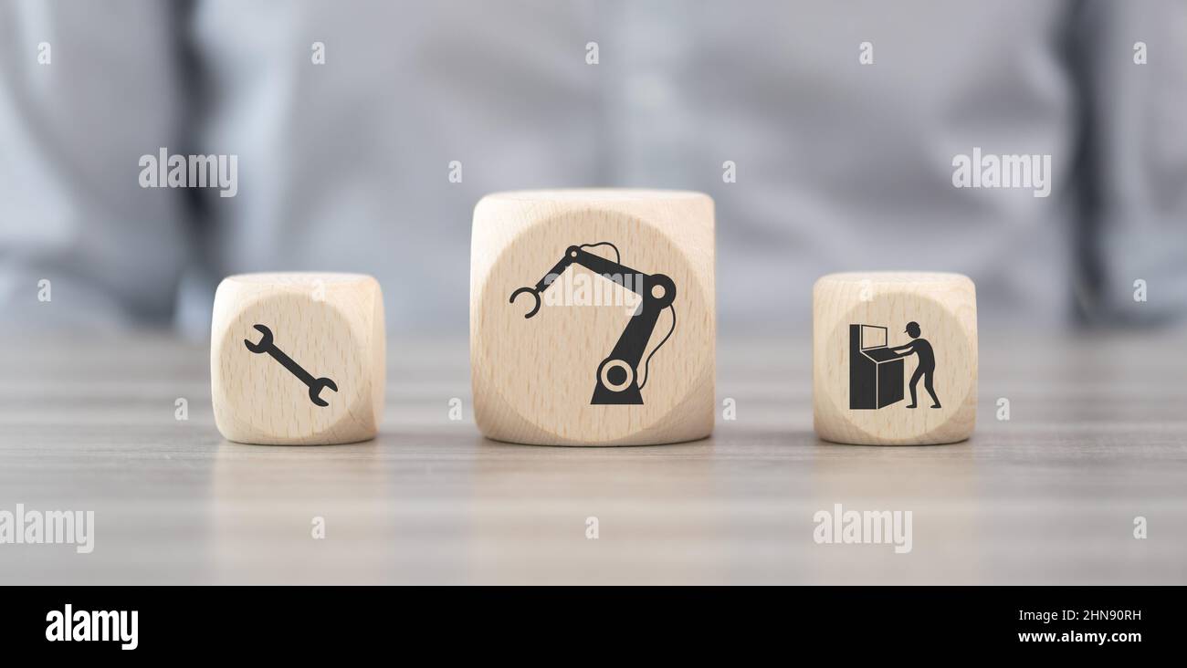 Wooden blocks with symbol of robotic industry concept Stock Photo - Alamy