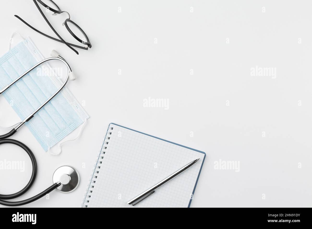Doctor desk with stethoscope and stationery Stock Photo - Alamy