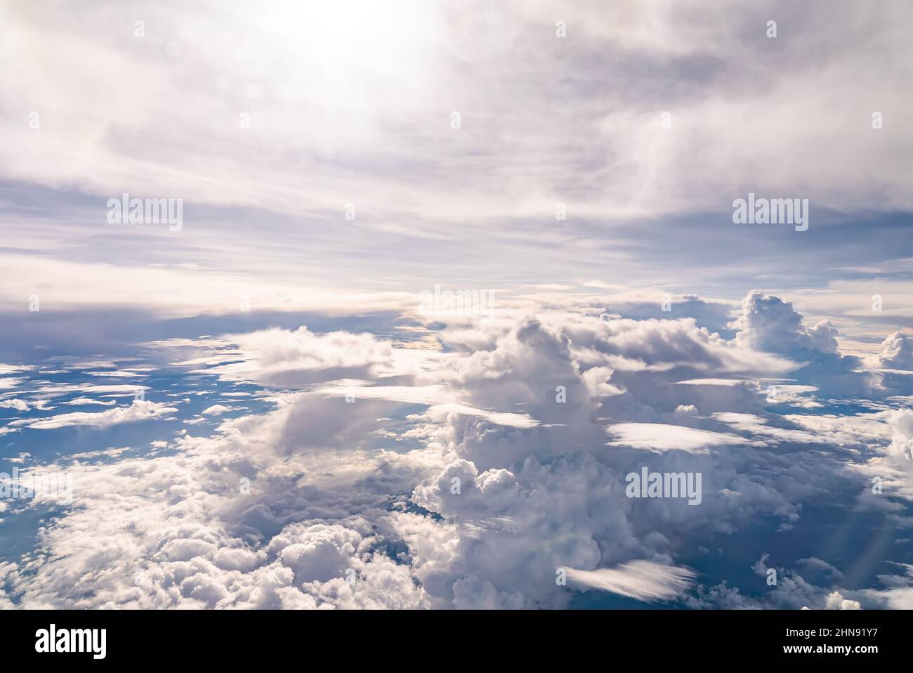 Aerial view over fluffy clouds hi-res stock photography and images - Alamy