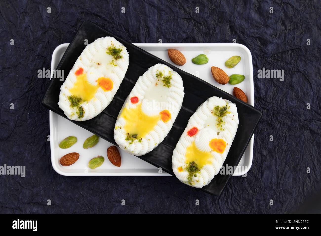 Indian Mithai Cham Cham Also Called Rasgulla Chomchom Or Rosogolla ...