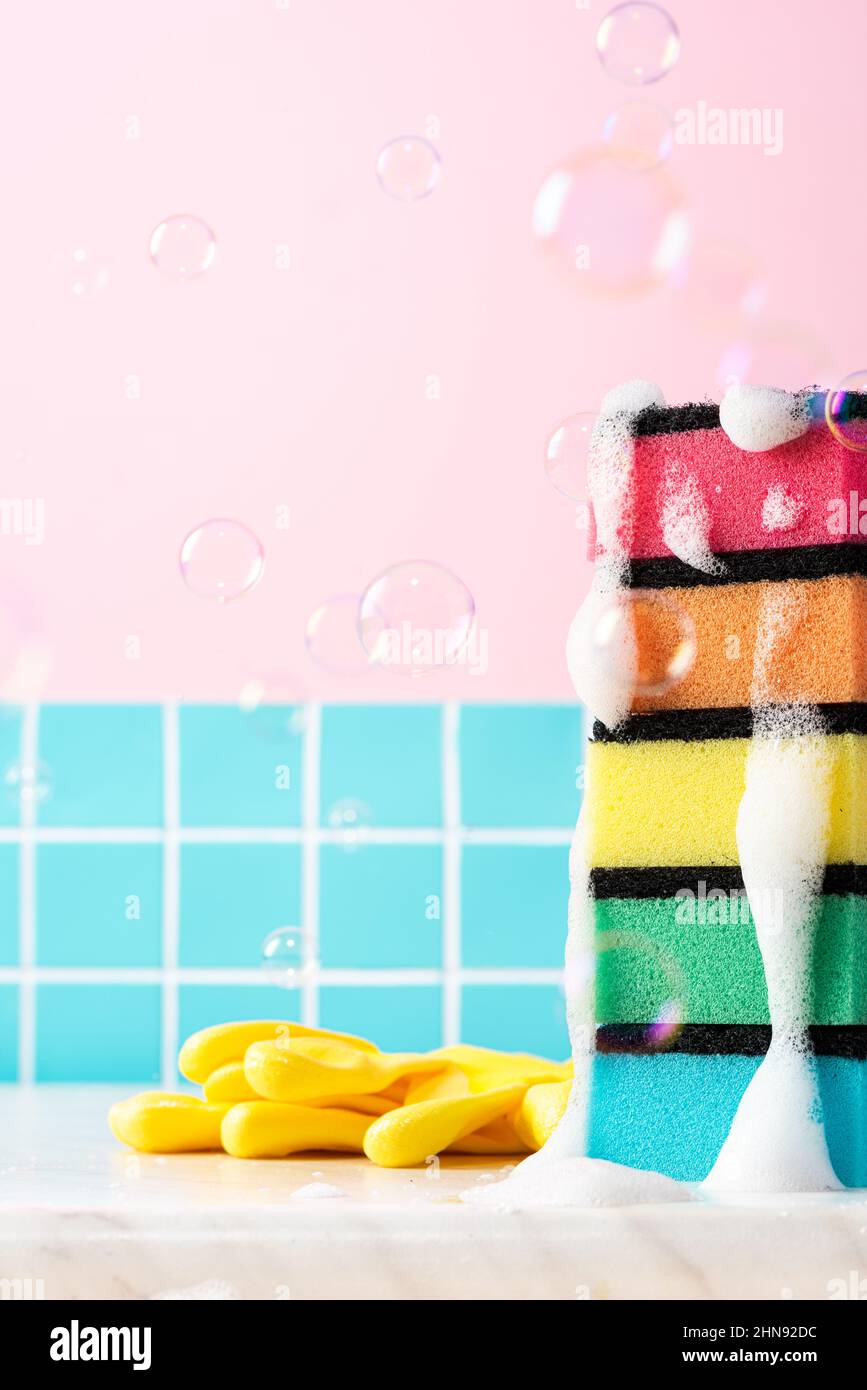 Colorful cleaning sponge on kitchen counter. Copy space background for ...