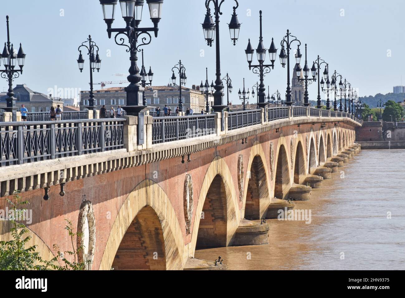 The elegant Pont de pierre, Stone Bridge, connecting the City of ...