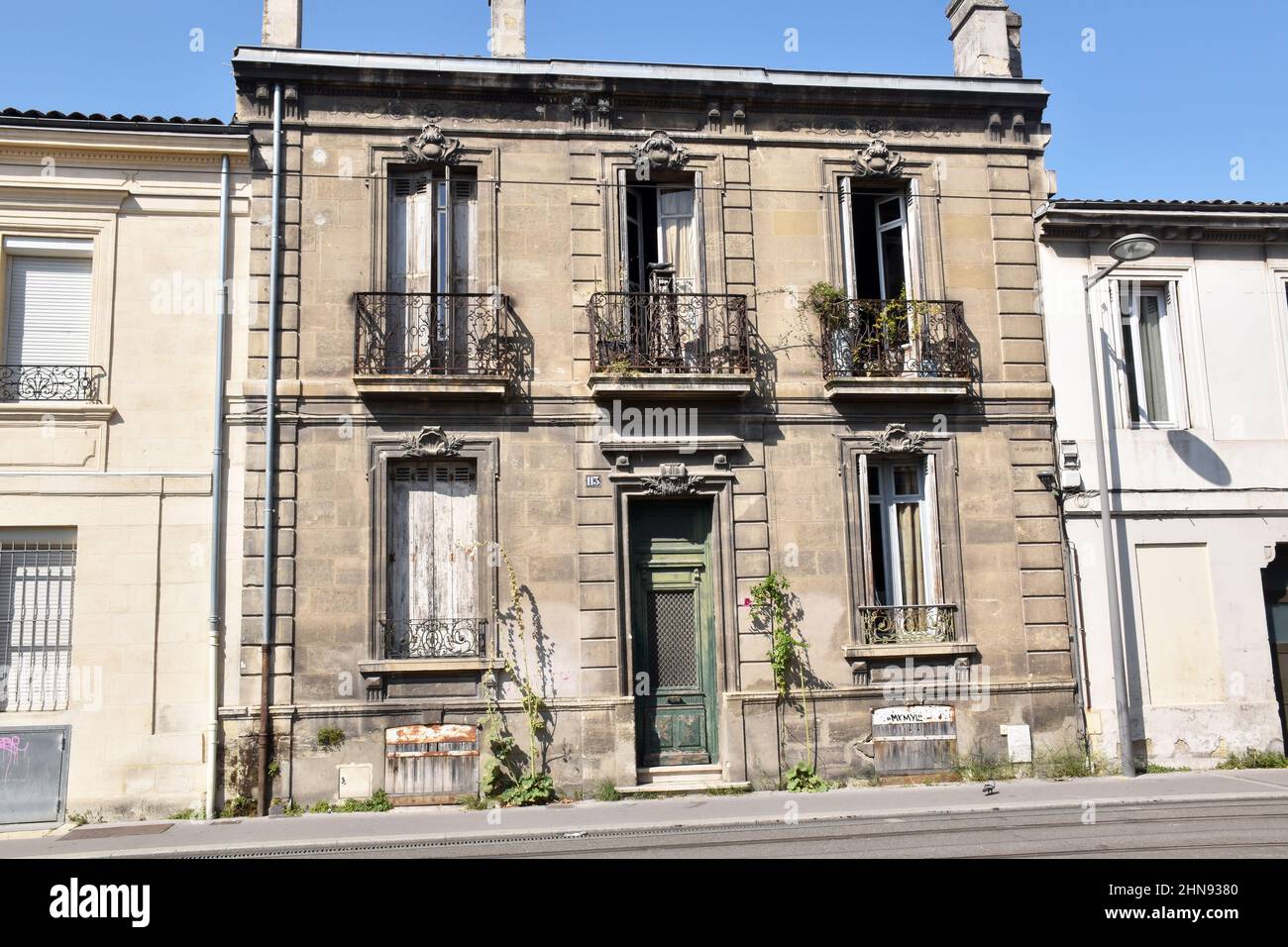 A typical C19 terraced house in Bordeaux, three bays two storeys, with ...