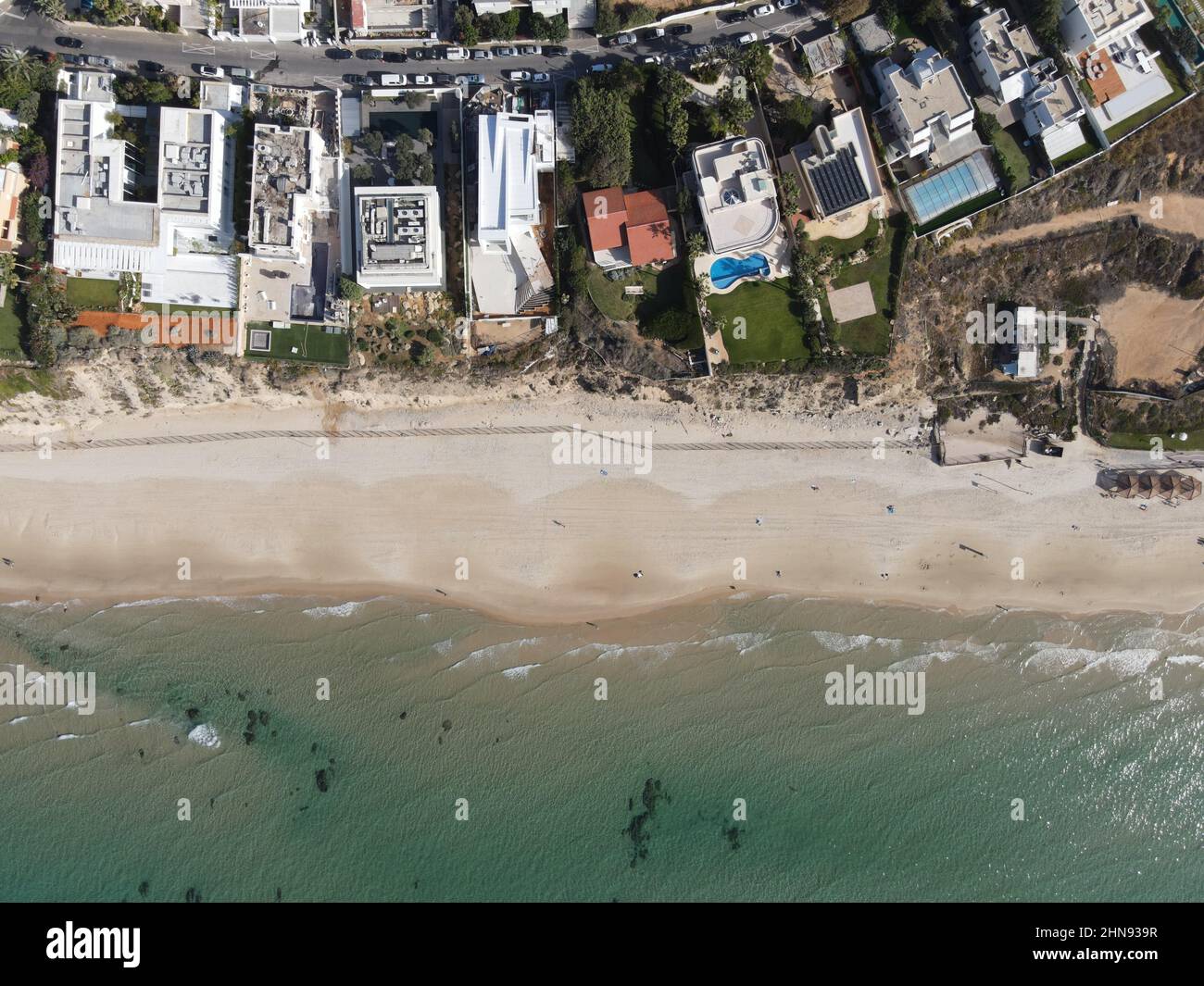 Aerial view of the beach and the houses on the coastline Stock Photo ...