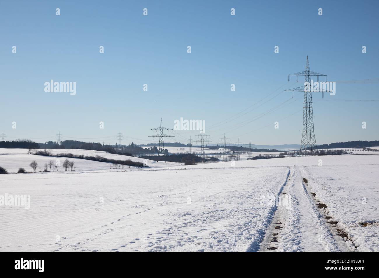 Electricity pylons covered in snow hi-res stock photography and images ...