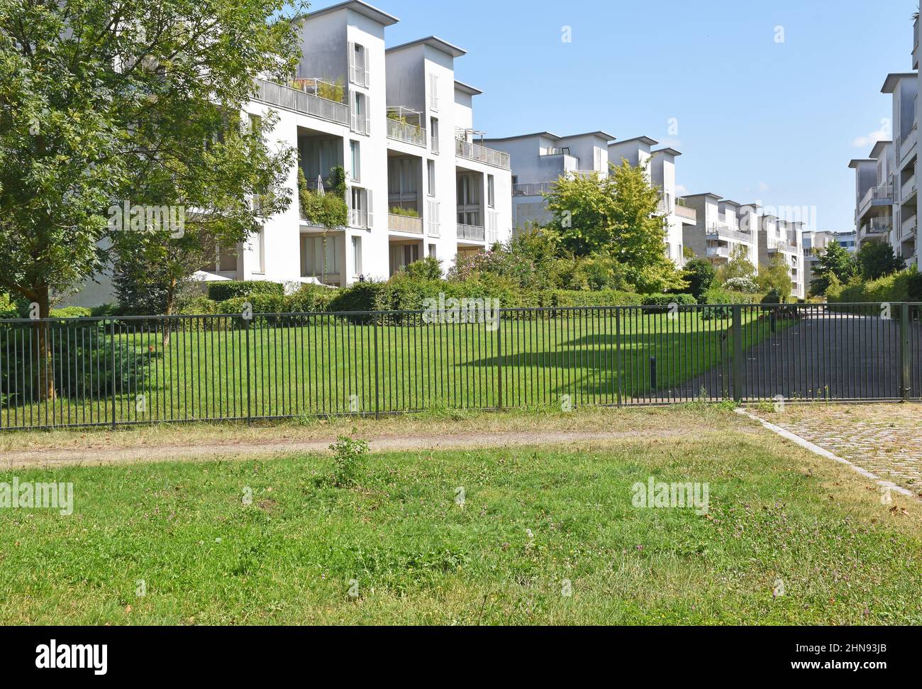 Three-storey block of apartments, each with a large balcony/terrace ...