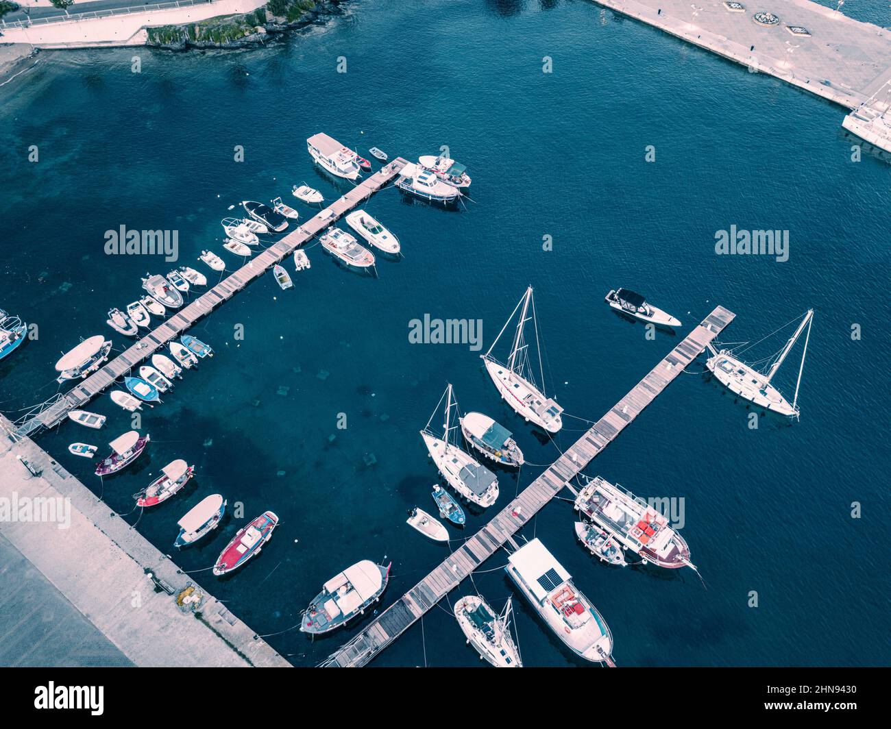Aerial view of the marina port with parked yachts and cruise and ...