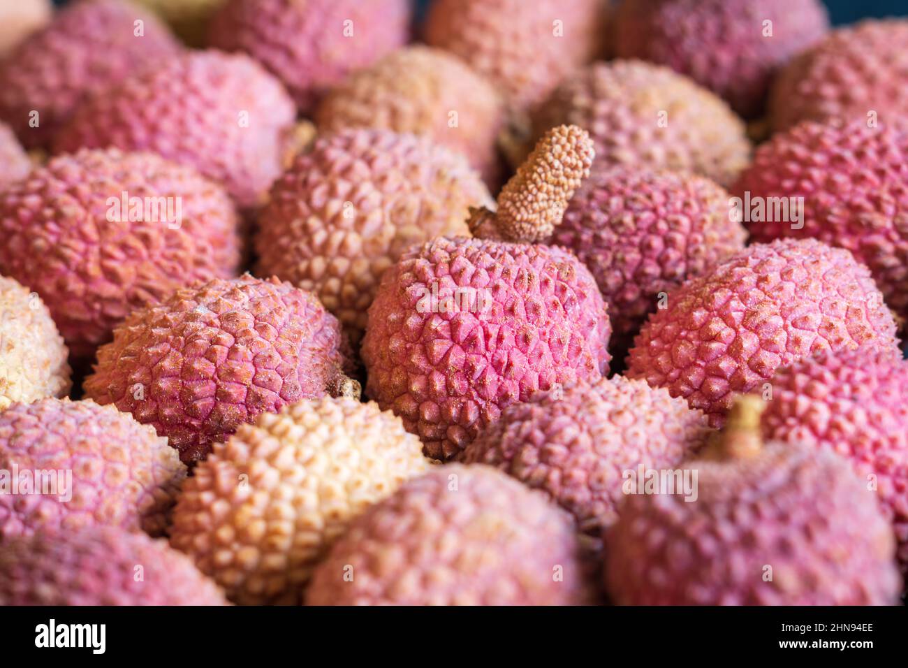 fresh ripe lychee fruits background Stock Photo - Alamy