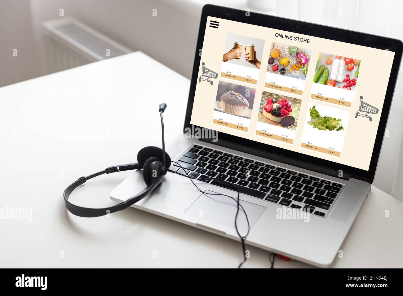 Food take away website in a laptop screen. Lunch at the office Stock ...