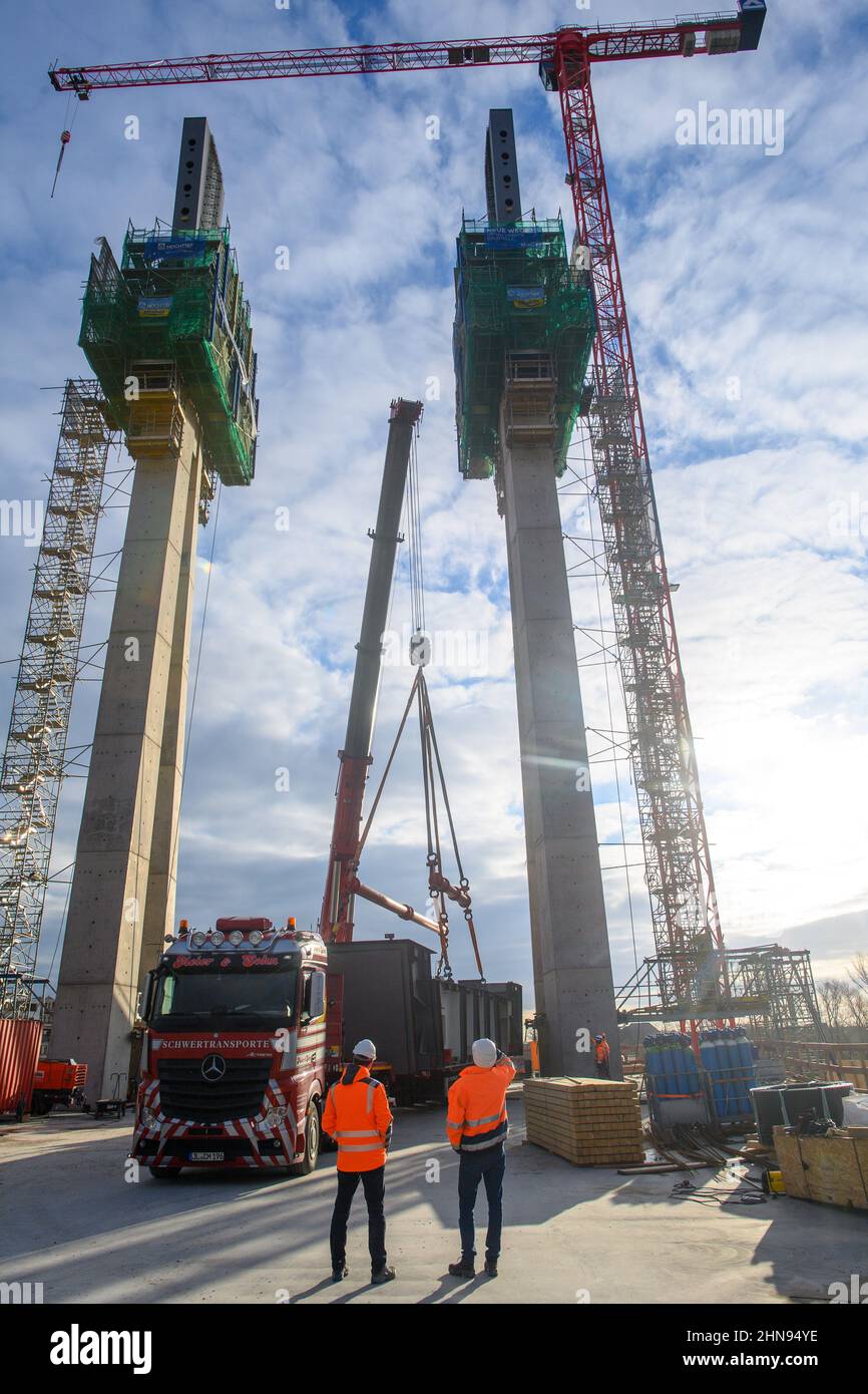 Magdeburg, Germany. 15th Feb, 2022. Workers at the construction site of ...