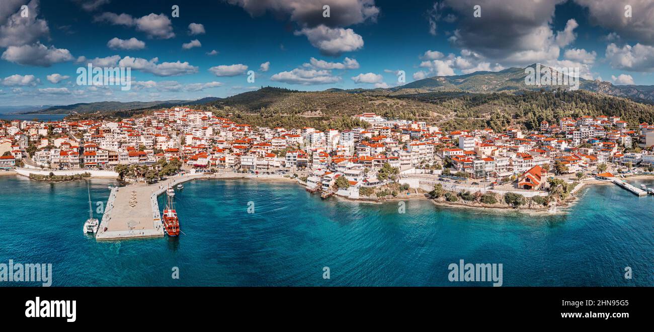 Wide aerial panoramic view of a resort sea town Neos Marmaras in ...