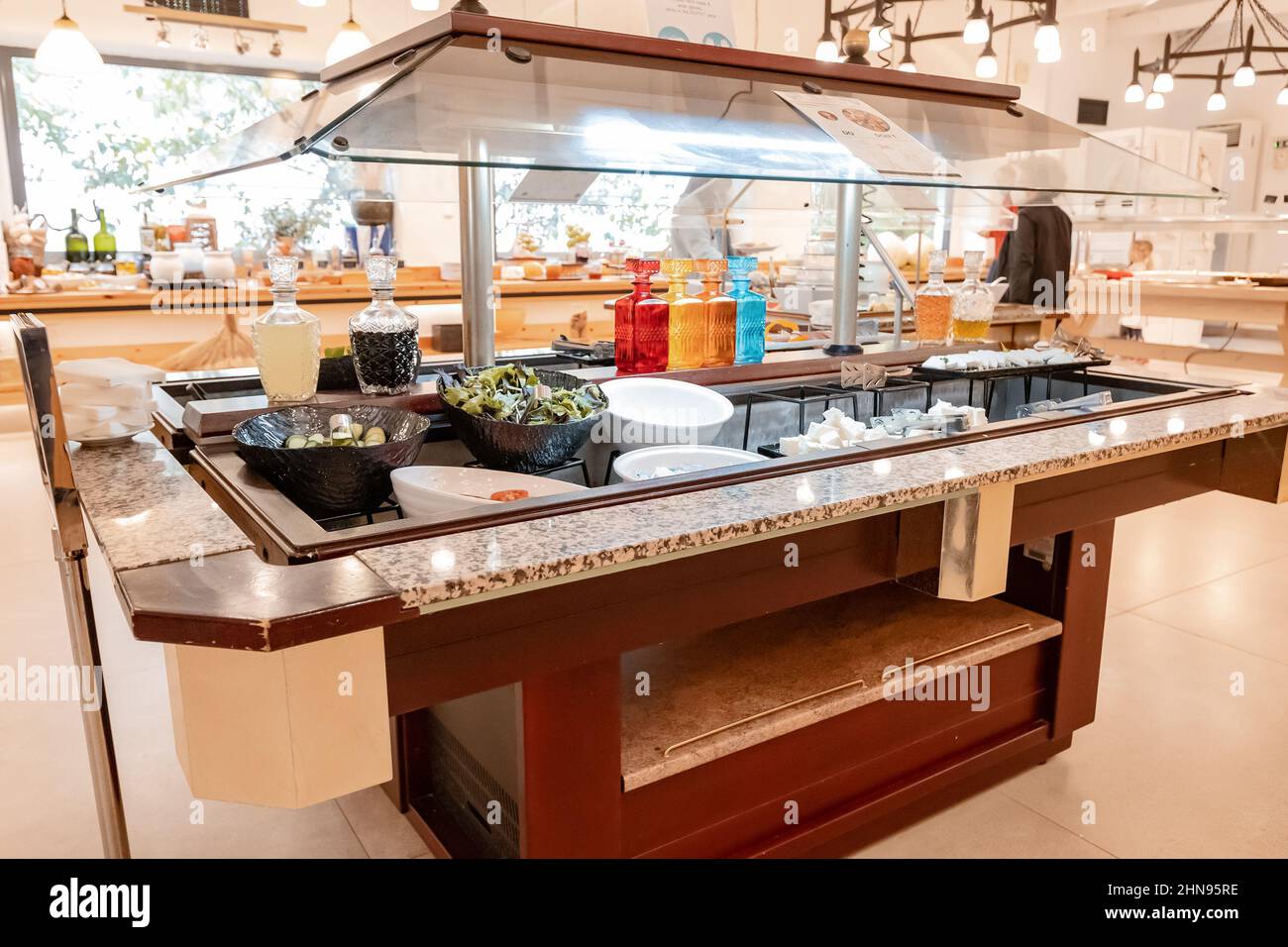 Self-service buffet in the hotel where visitors collect food from open ...