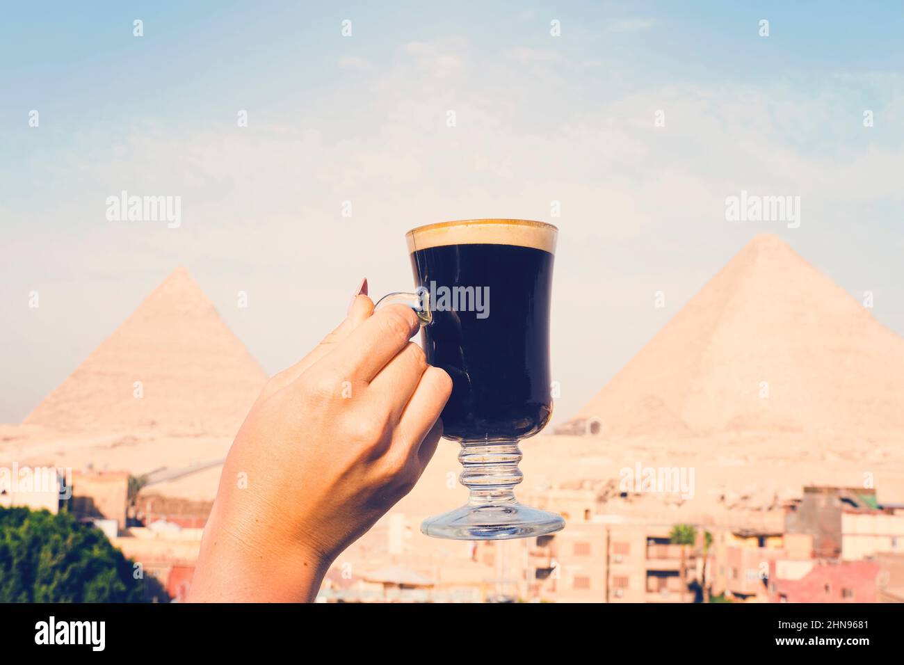 Traveler's breakfast. A table in an outdoor restaurant with a ...