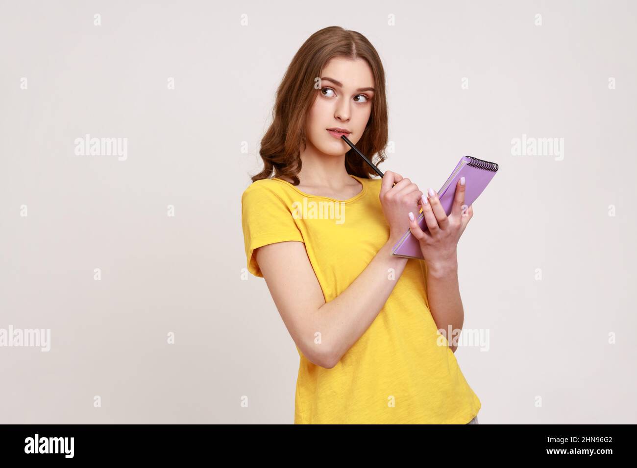 Beautiful teen girl writing in notebook hi-res stock photography and ...