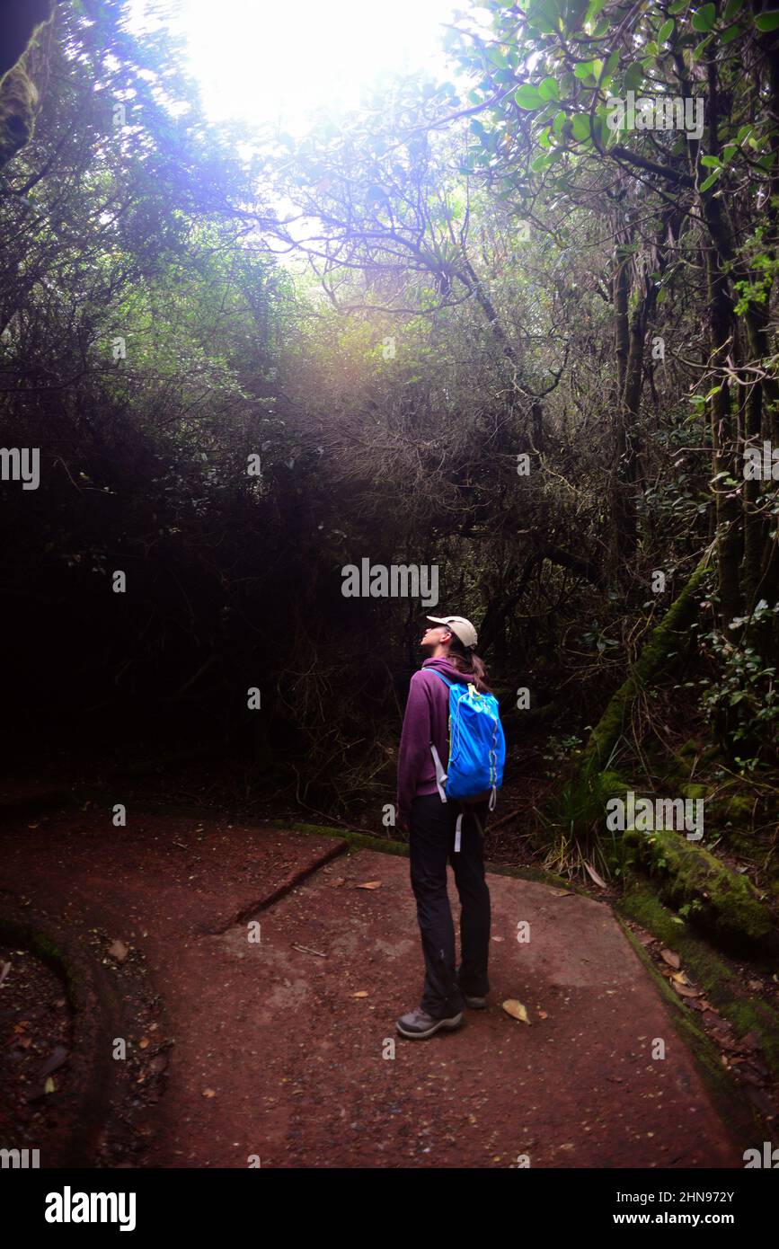 Young adventurous woman exploring Poas Volcano National Park in Costa ...