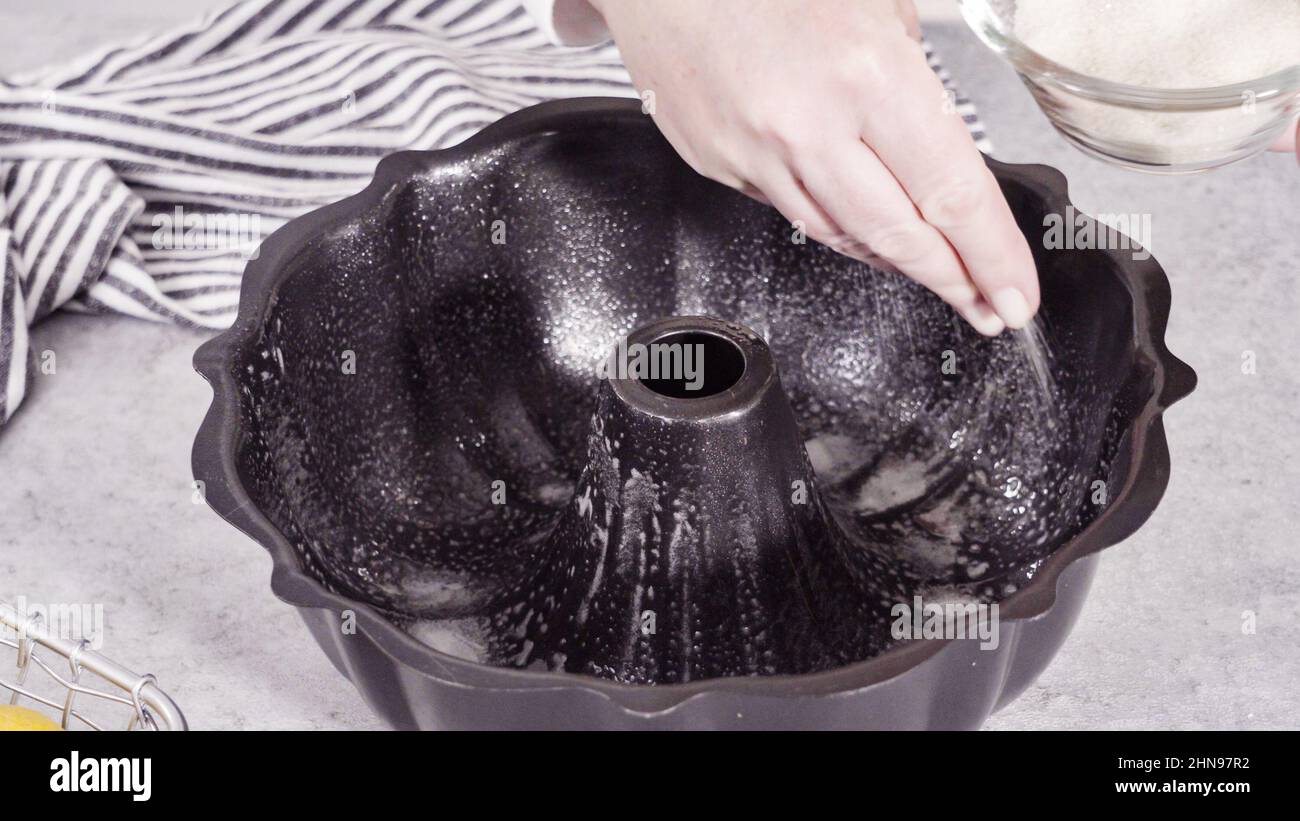 Empty baking pan prepared to bake a lemon pound cake Stock Photo - Alamy