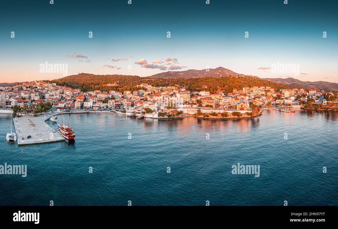 Aerial panorama of a scenic resort town Neos Marmaras with yacht marina ...