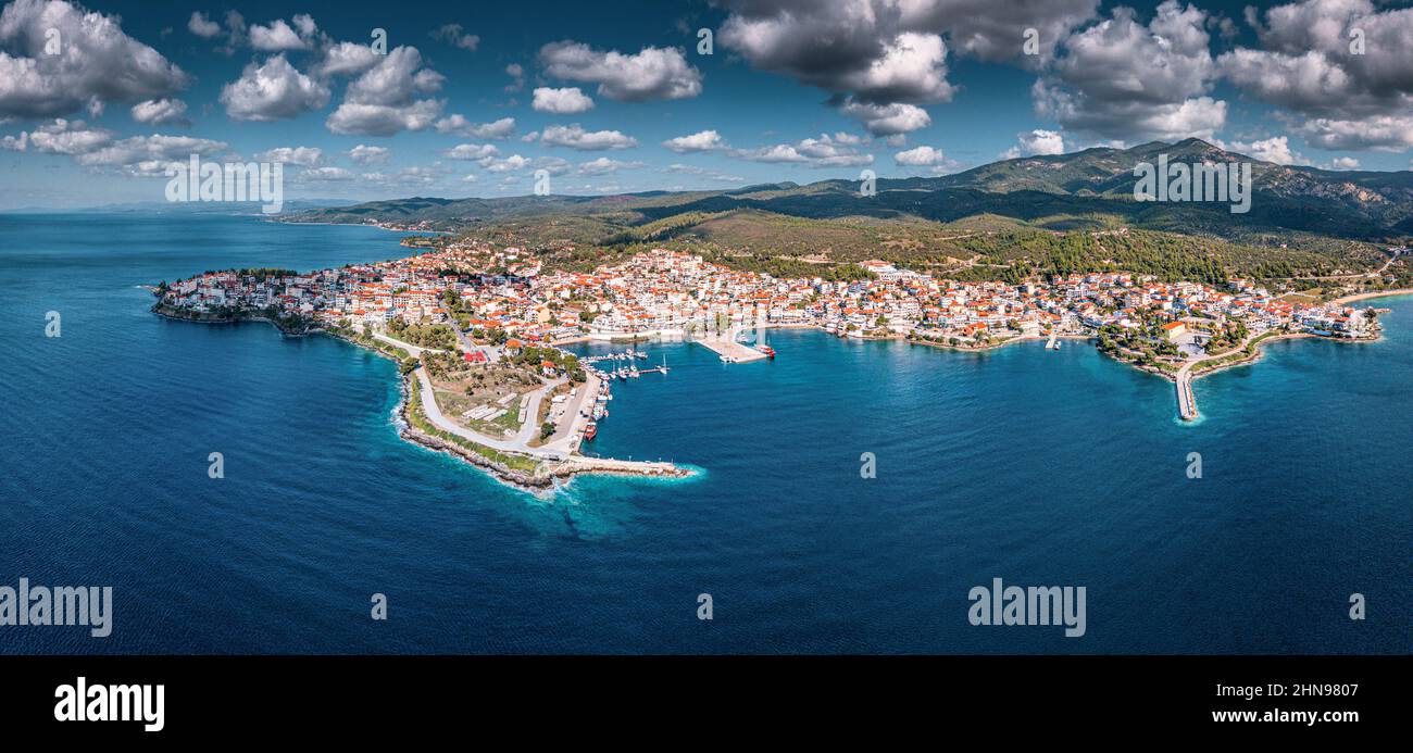 Wide aerial panoramic view of a resort sea town Neos Marmaras in ...
